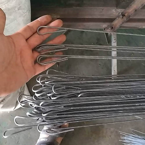 Automatic bale tie wire machine